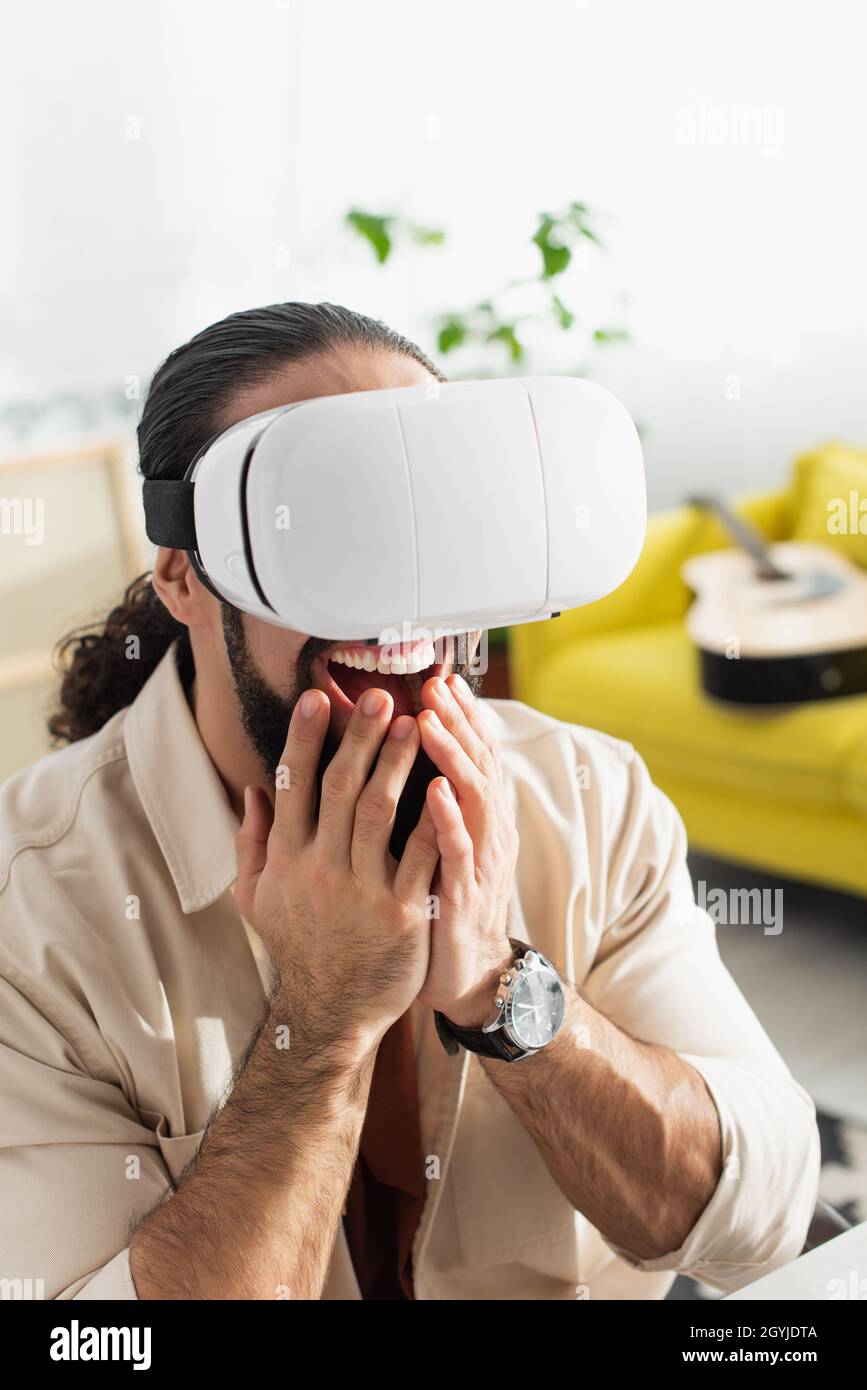 Scared man in vr headset hi-res stock photography and images - Alamy