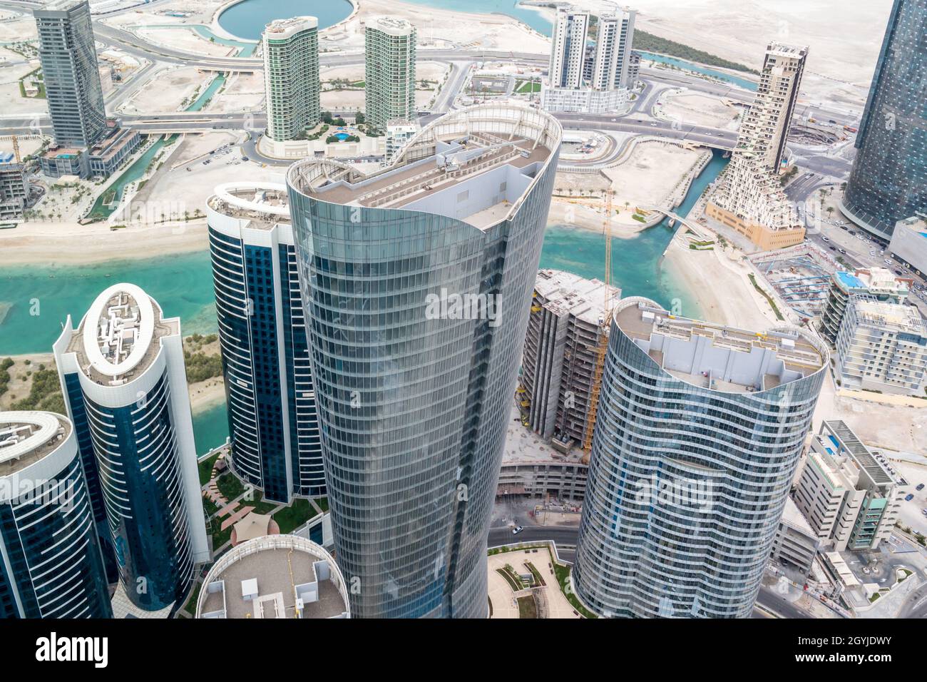 Aerial drone shot of Al Reem island buildings - Gate towers, Sun and ...