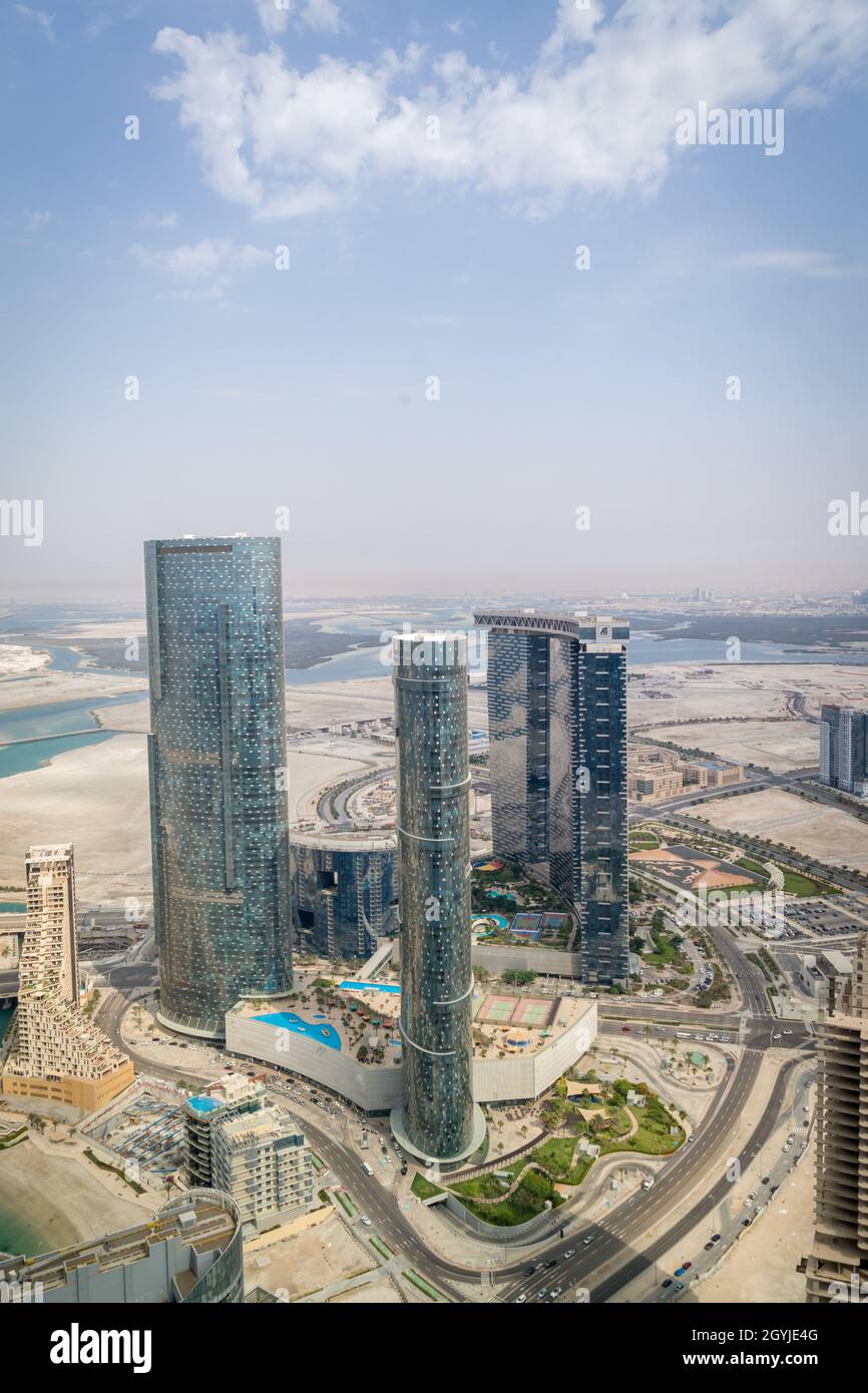 Aerial drone shot of Al Reem island buildings - Gate towers, Sun and ...