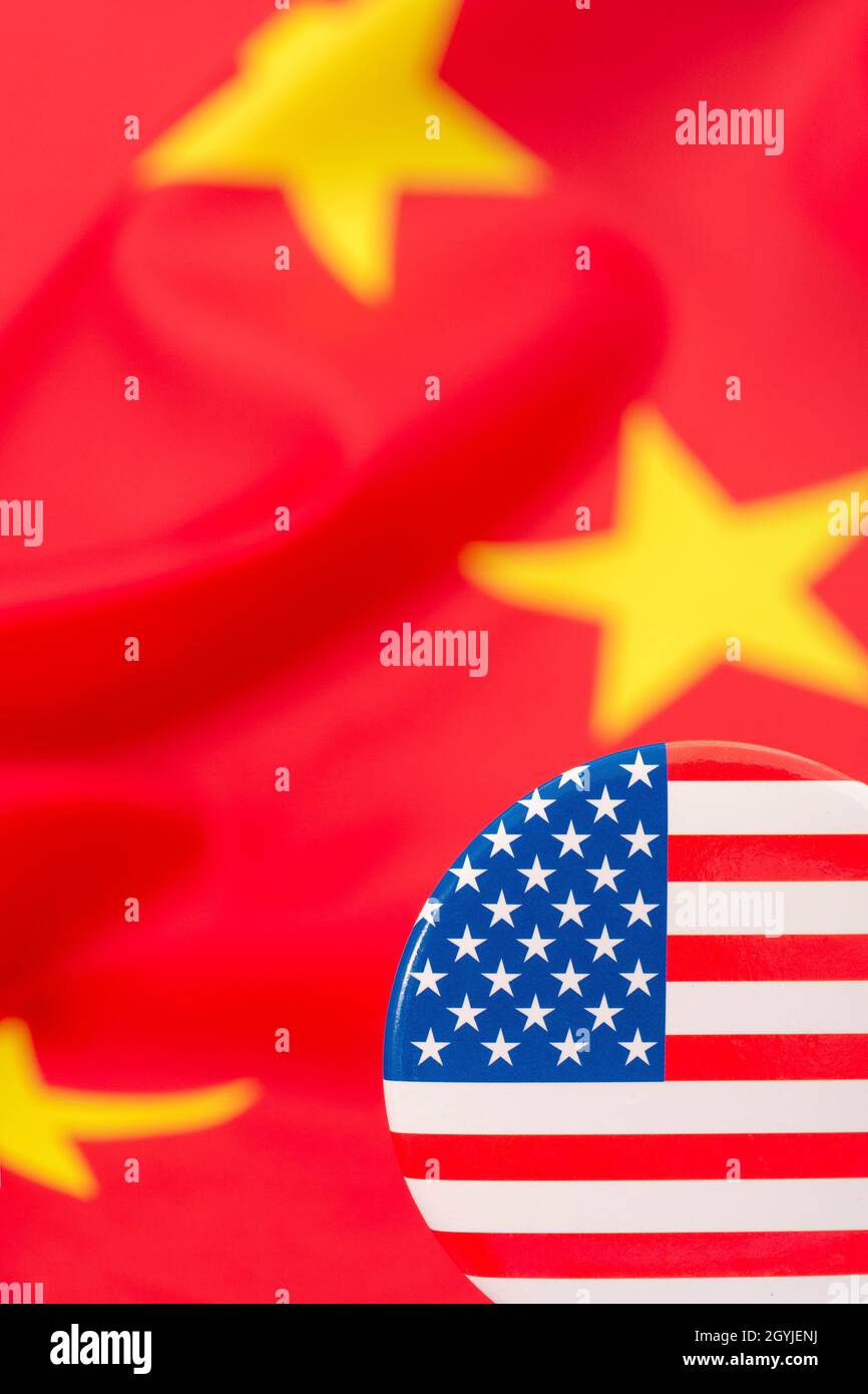 Stars and Stripes button set against yellow & red of China flag. For US ...