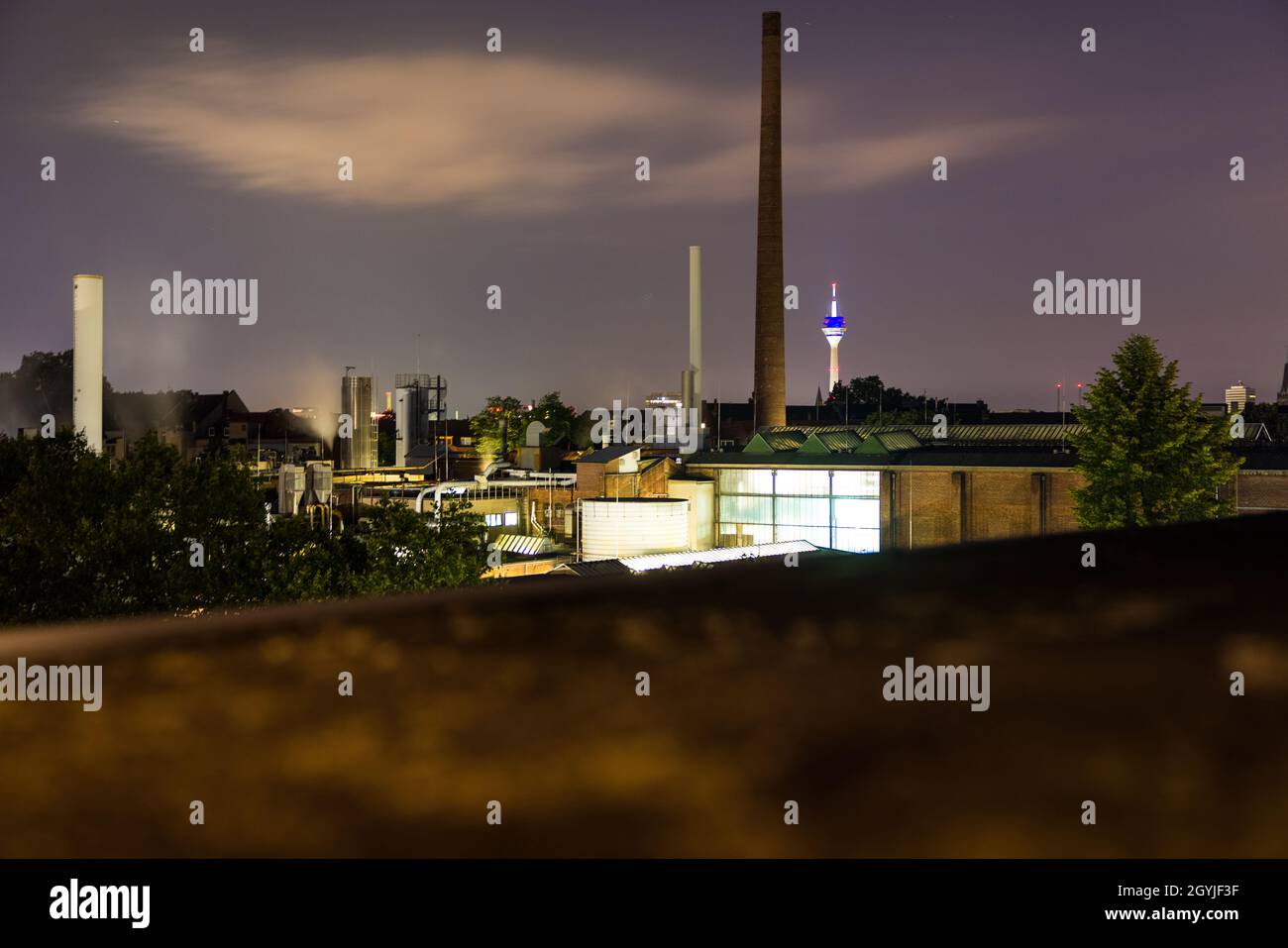 Rhine Tower illuminated at night in Dusseldorf, Germany Stock Photo - Alamy