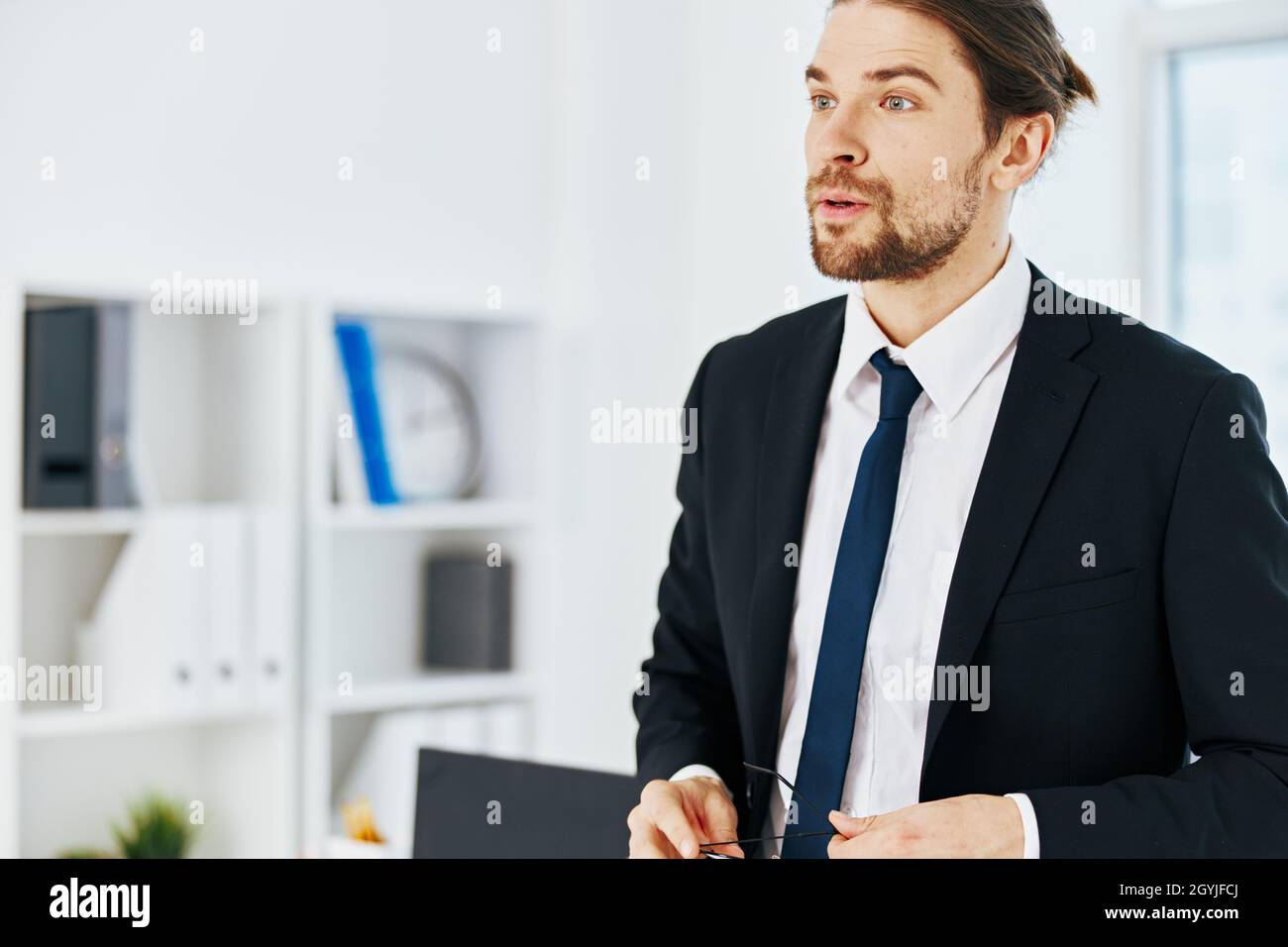 manager in the office with documents lifestyle Stock Photo - Alamy