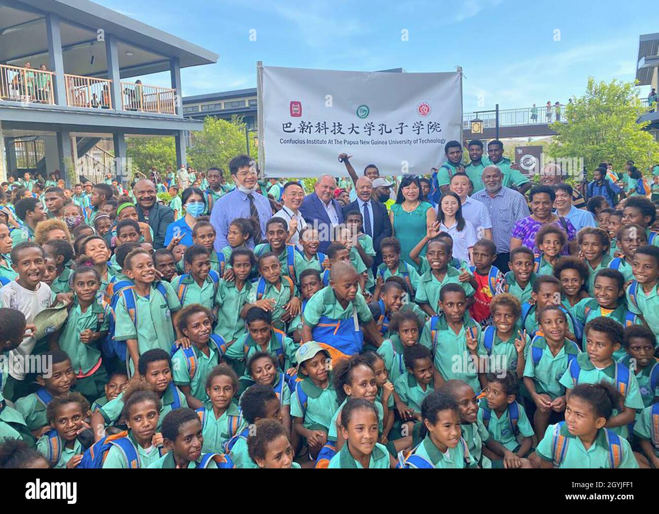 Sydney. 8th Oct, 2021. Students and guests pose for a photo during the ...