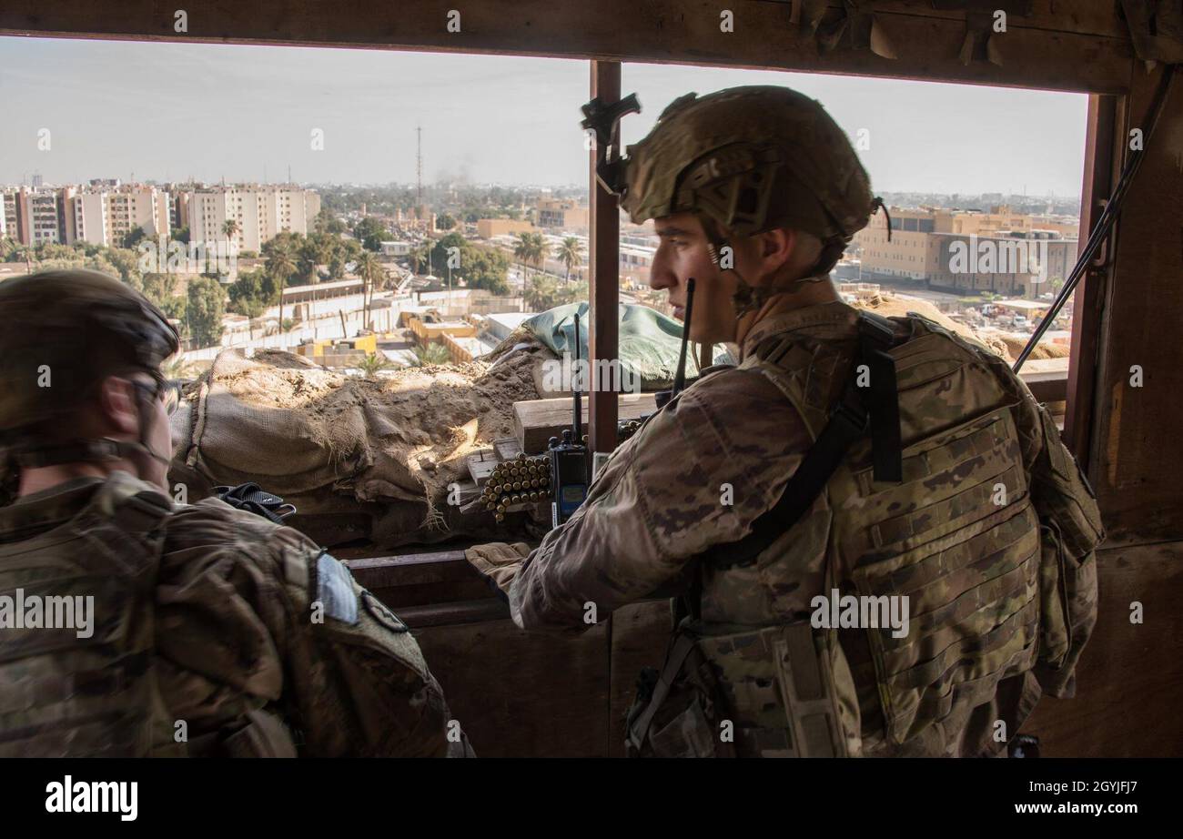 U.S. Army Soldiers provide armed overwatch at the U.S. Embassy Compound ...