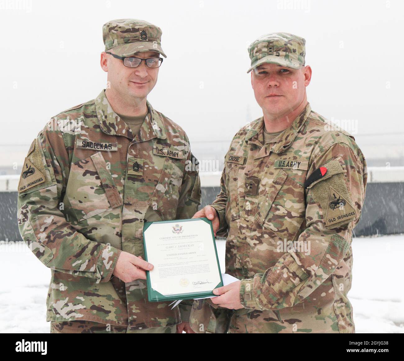 Sgt. 1st Gary Sadeckas poses with Chief Warrant Officer 2 Fred Crose ...