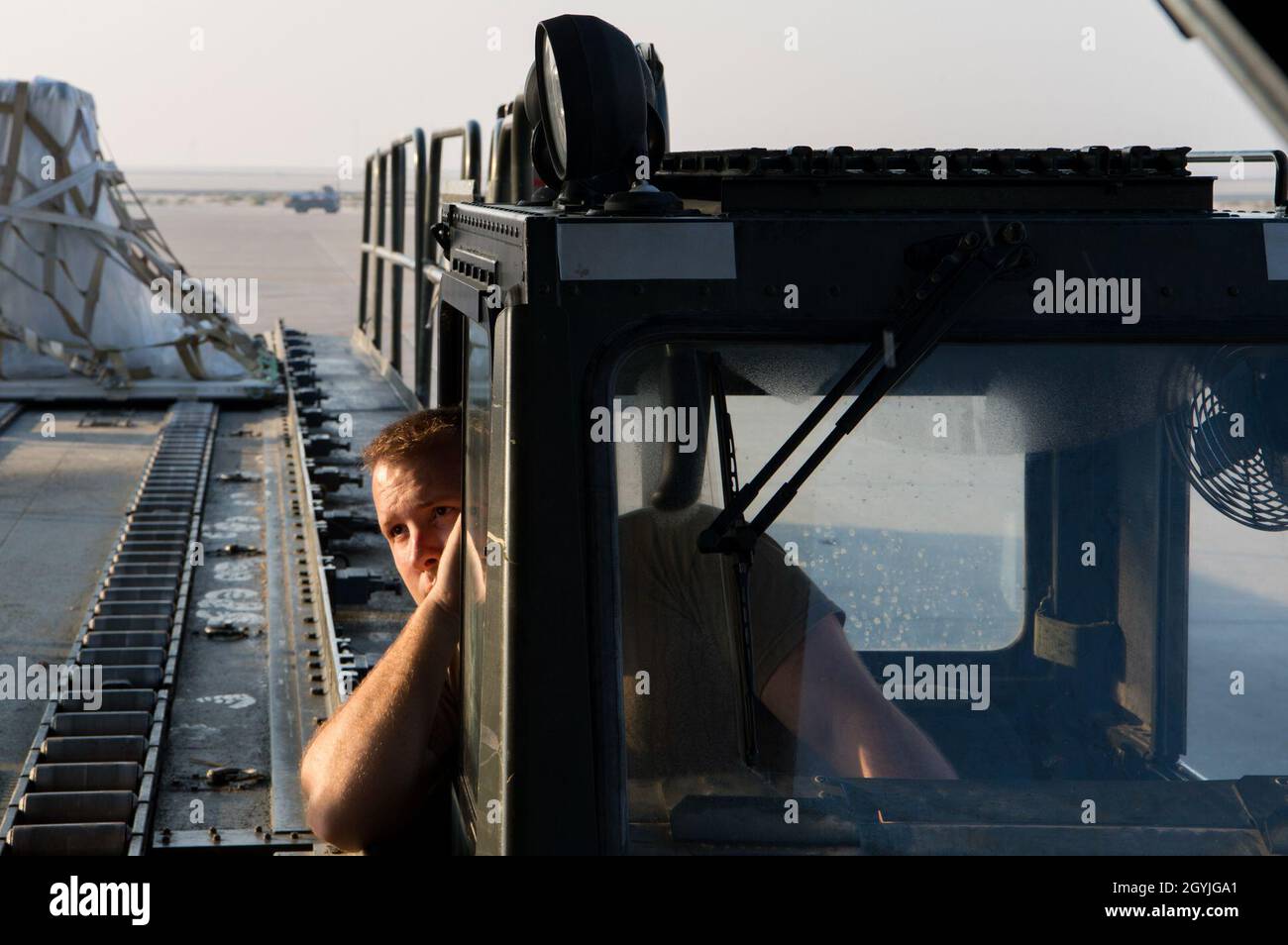 A U.S. Air Force aerial porter assigned to the 8th Expeditionary Air ...