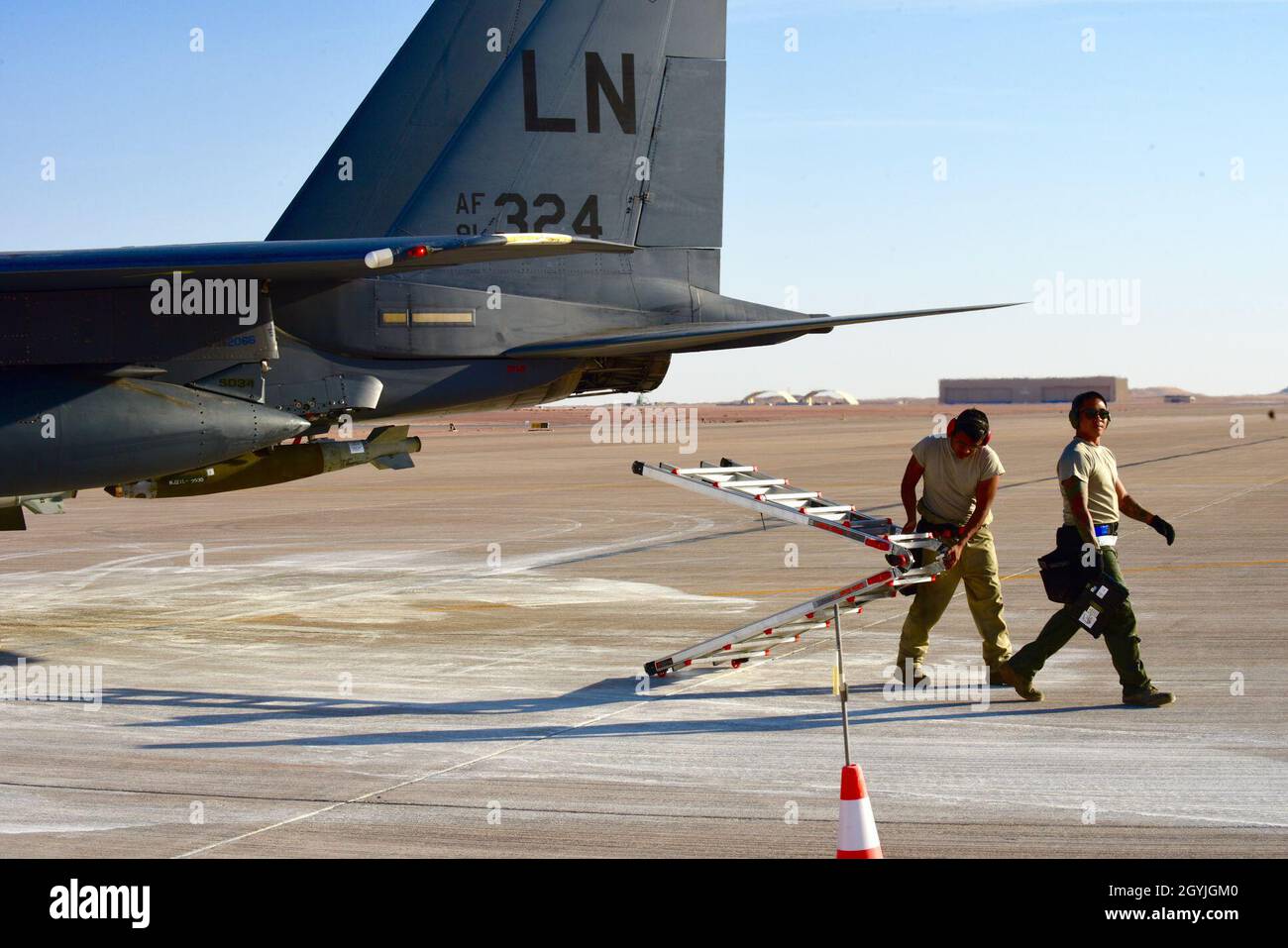 Two U.S. Air Force crew chiefs assigned to the 378th Expeditionary ...