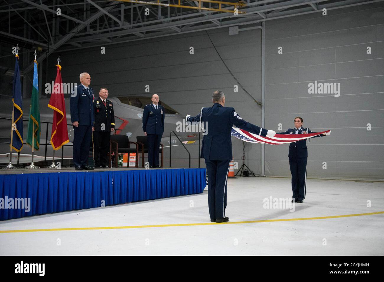 The colors are presented by members of the Base Honor Guard to outgoing ...