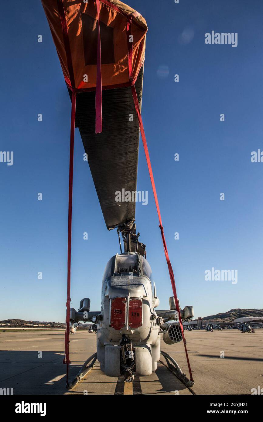 A U.S. Marine AH-1W Super Cobra with Marine Light Attack Helicopter ...
