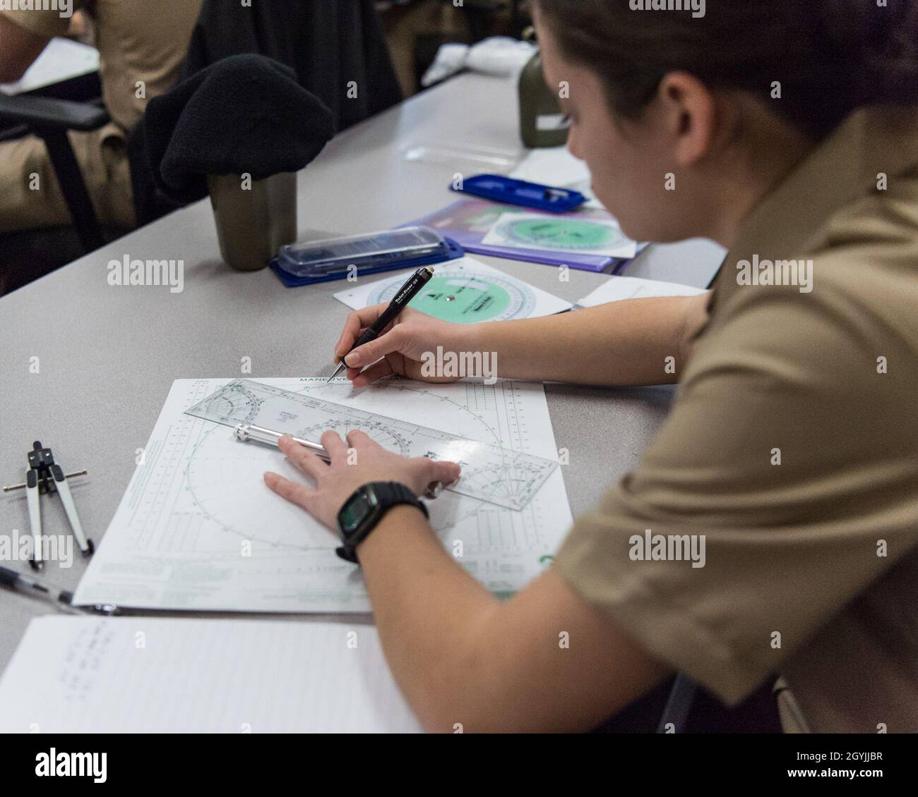 A student with Officer Candidate School (OCS) class 06-20 practice ...
