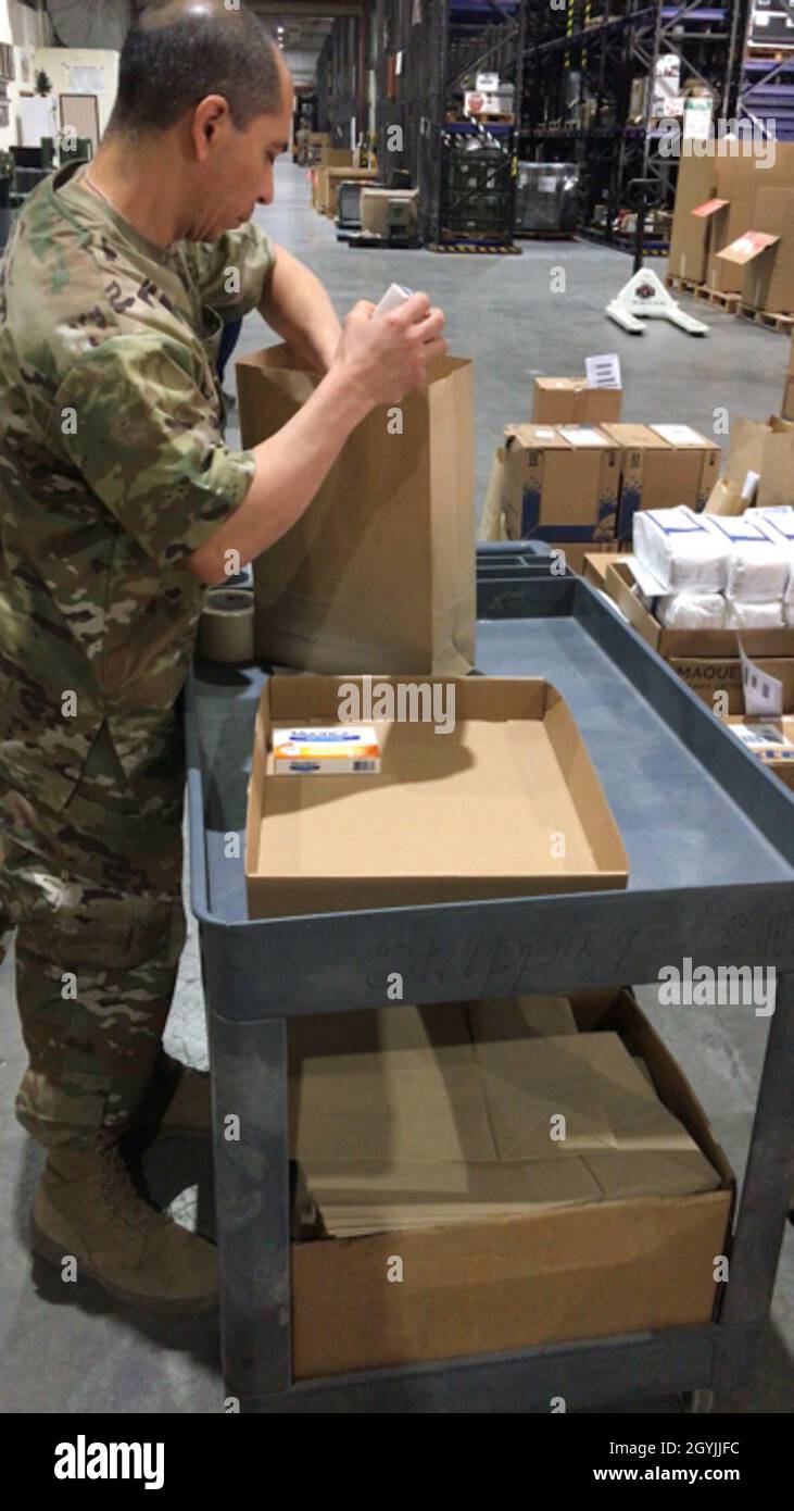 Spc. Aloiz Linares, a Soldier with the 387th Medical Logistics Company ...