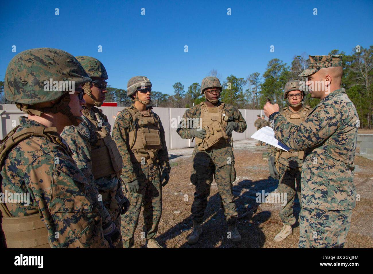 U.S. Marine Corps 1st Lt. Patrick Galindo, right, a logistics officer ...