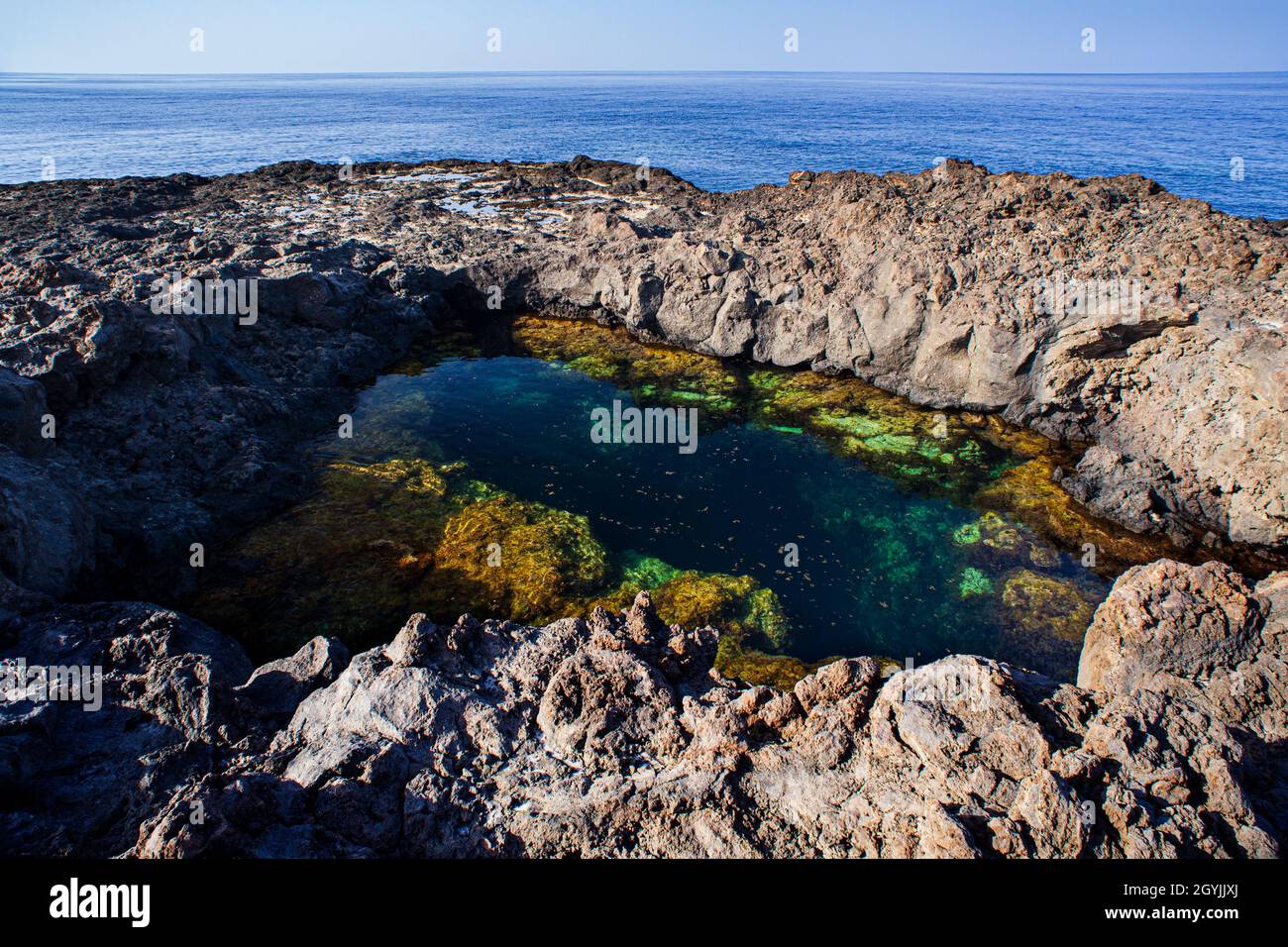 View of the lava beach of Linosa Called Piscine, Sicily. Italy Stock ...