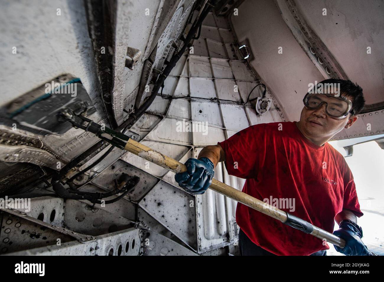 Guy Du, a contractor who works for Starlight Corporation cleans panels ...
