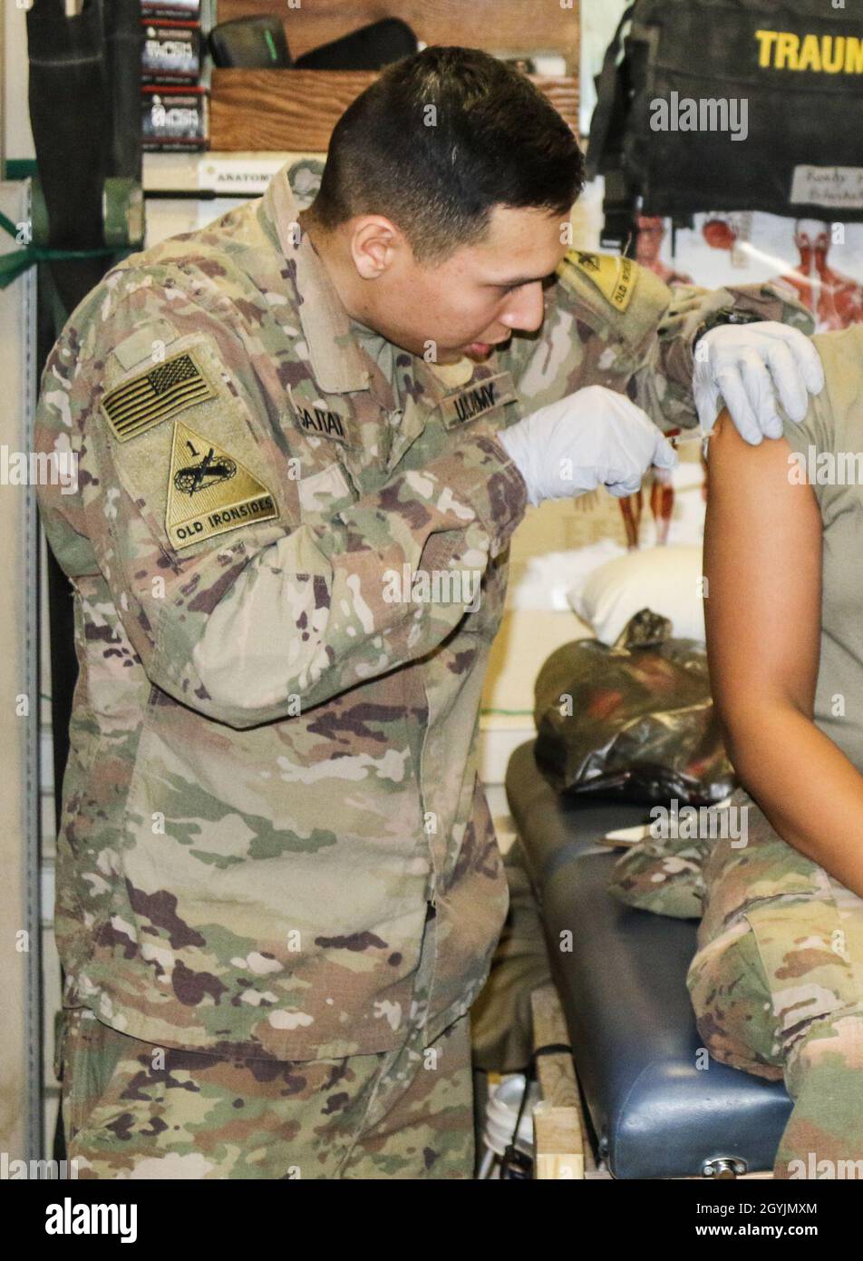 Spc. Steven Gaitan, a combat medic specialist for the 1st Armored ...