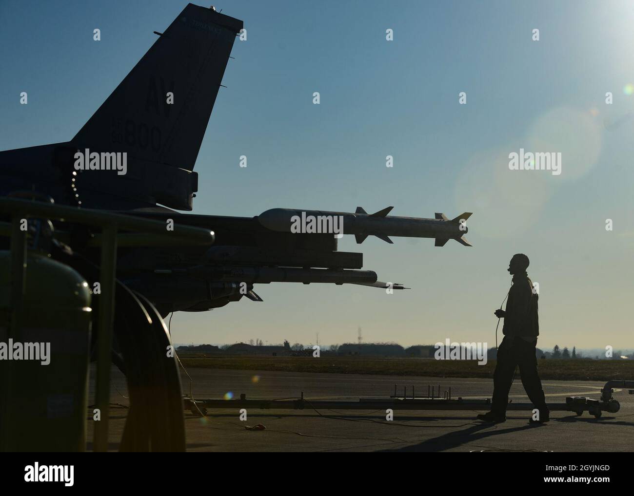 A U.S. Air Force Airman from the 31st Fighter Wing stands near a U.S ...