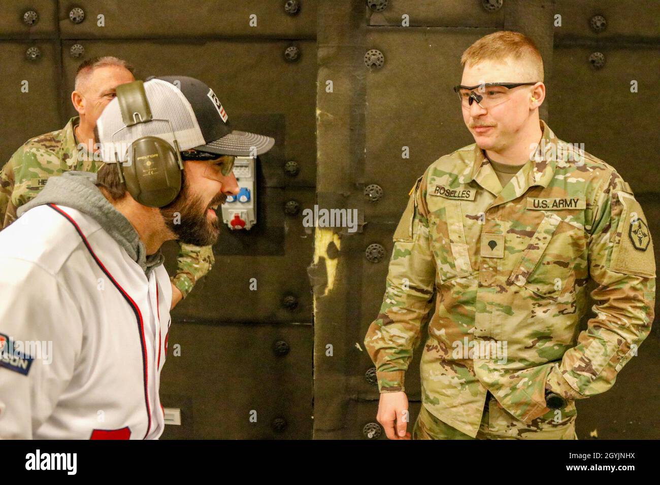 Washington Nationals outfielder Adam Eaton, left, looks downrange at ...