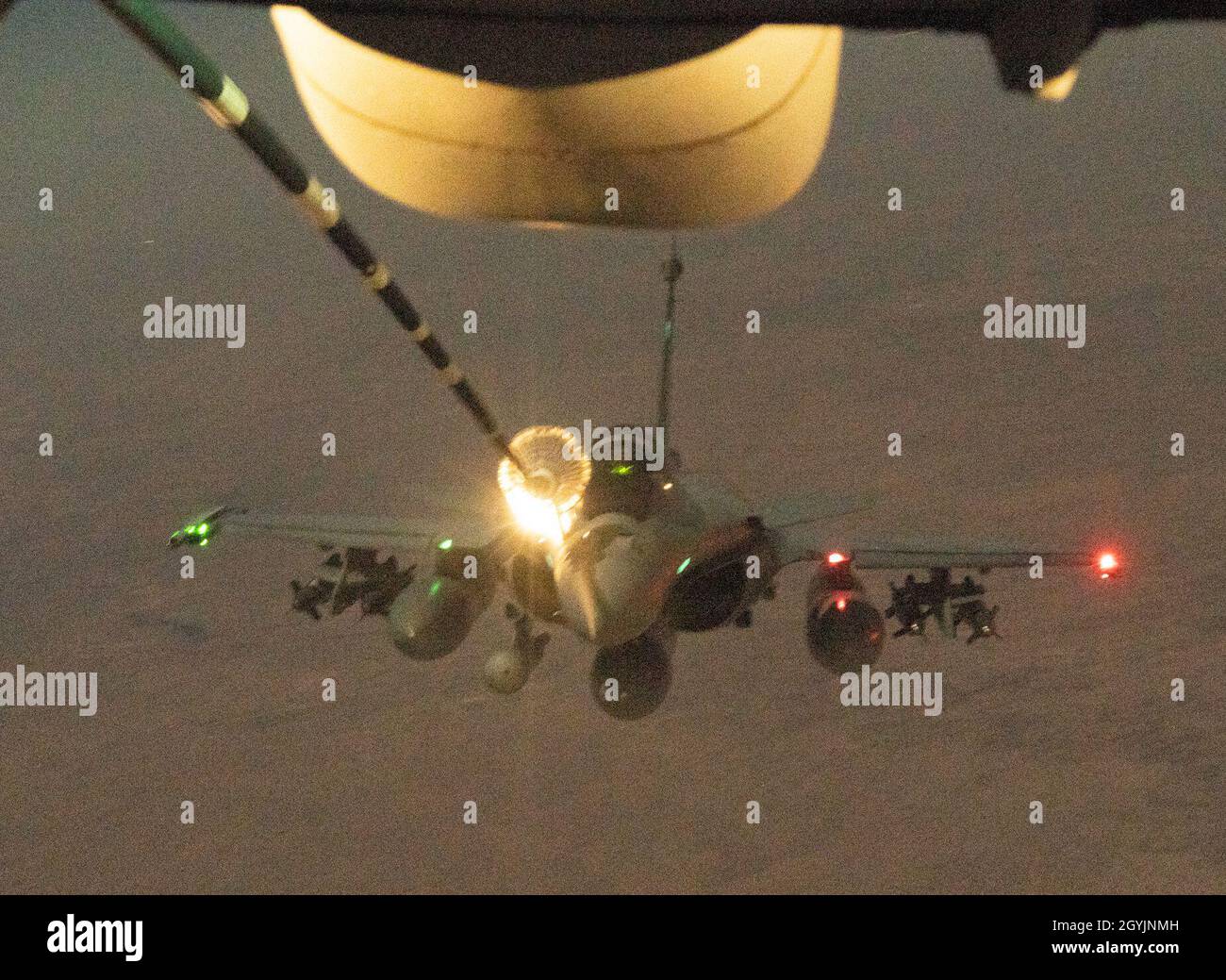 A French Rafale conducts nighttime air refueling with a U.S. Air Force ...