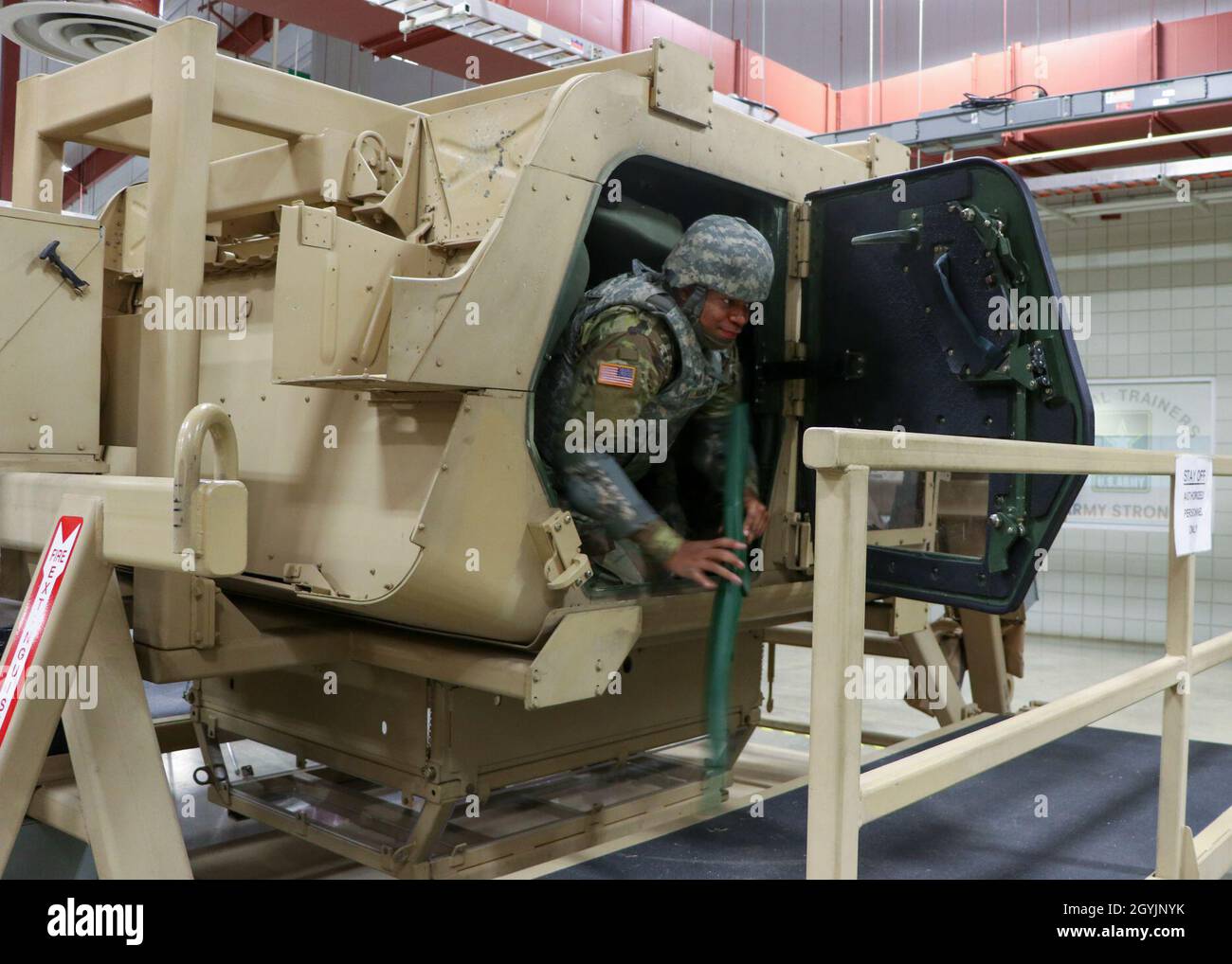 Pvt. Oveon Monroe, 1st Theater Sustainment Command (TSC), exits the ...