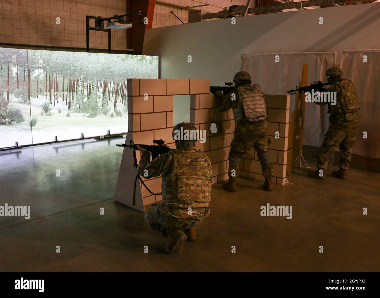 A group of soldiers with the 1st Theater Sustainment Command (TSC), run ...