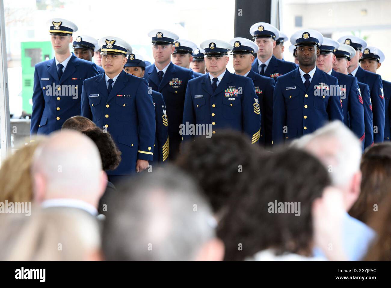 The Coast Guard Cutter Daniel Tarr's crew stands at attention during ...