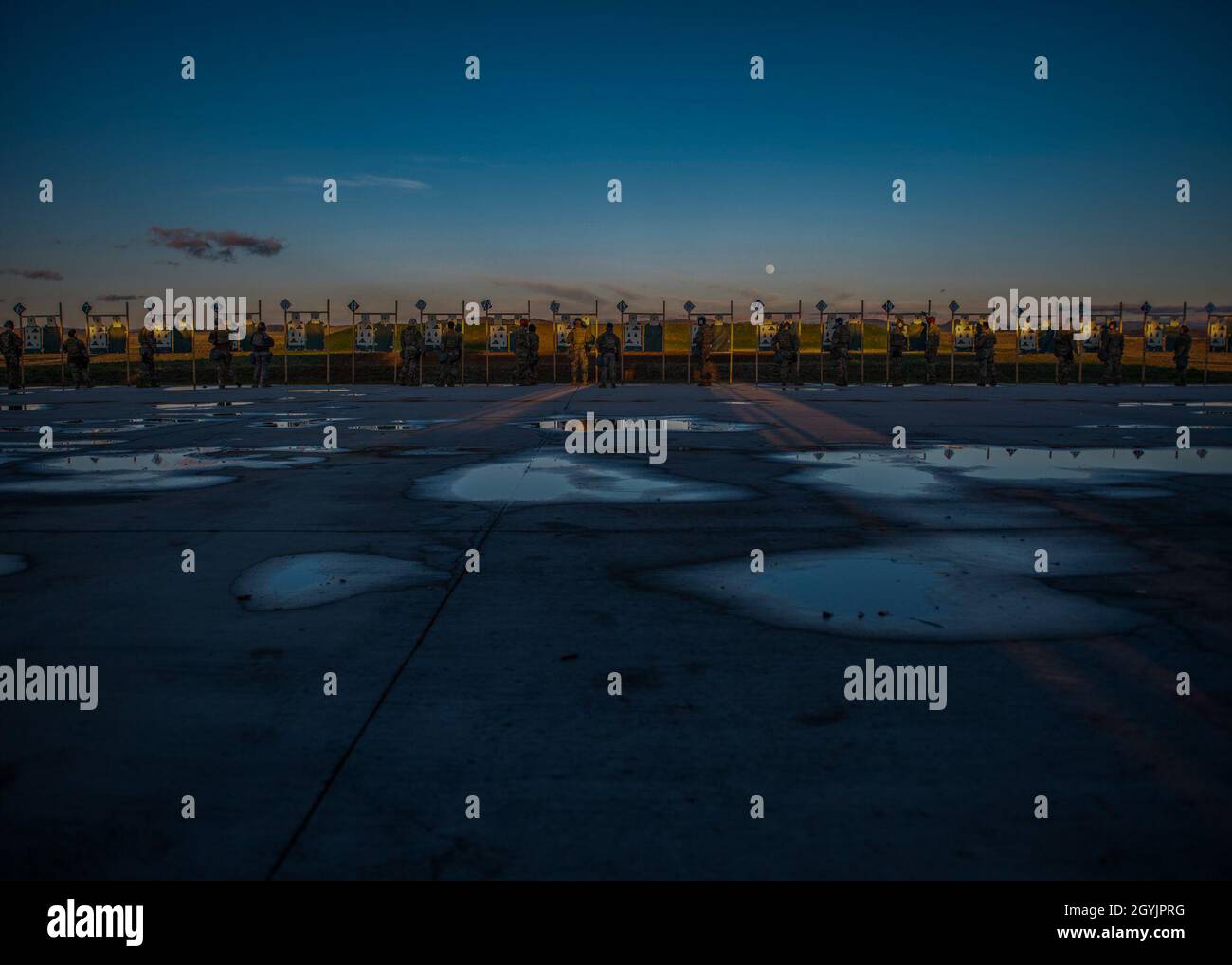 Airmen from the 9th Security Forces Squadron inspect their targets at ...