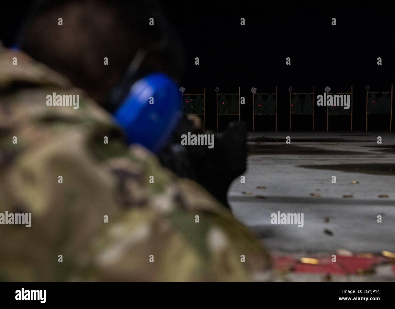 An Airman from the 9th Security Forces Squadron prepares to fire his M4 ...