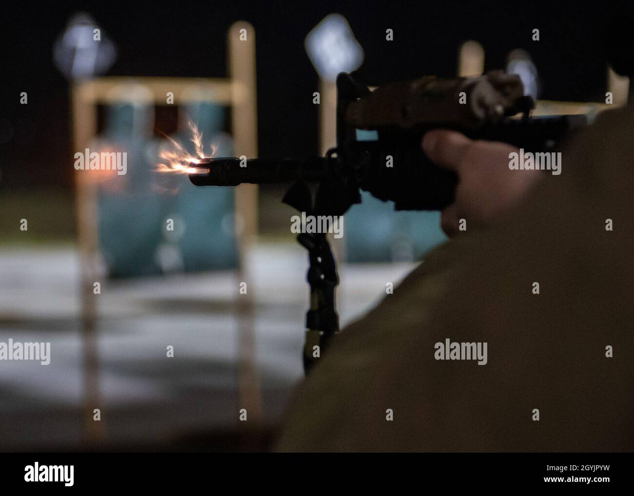 An Airman from the 9th Security Forces Squadron fires their M4 carbine ...