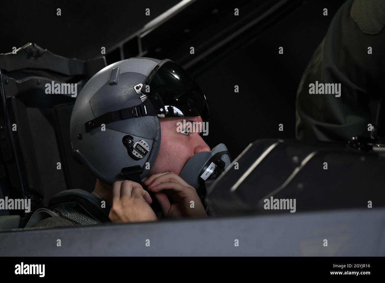 Civil Air Patrol Cadet Colonel Zane Fockler tightens his helmet in ...