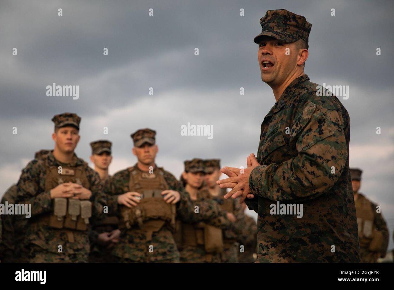 U.S. Marine Corps 1st Sgt. Joshua Celis speaks with Marines with ...