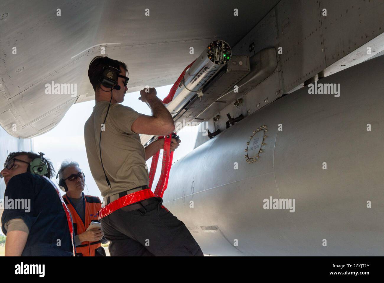 Airmen of the 18th Aircraft Maintenance Squadron arm a 44th Fighter ...