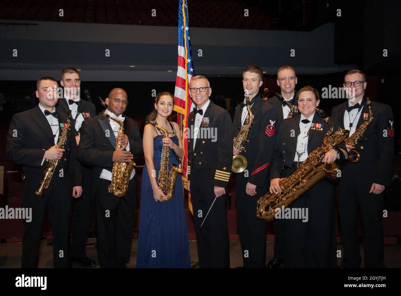 Featured soloists Otis Murphy and Asya Fateyeva stand with Capt ...