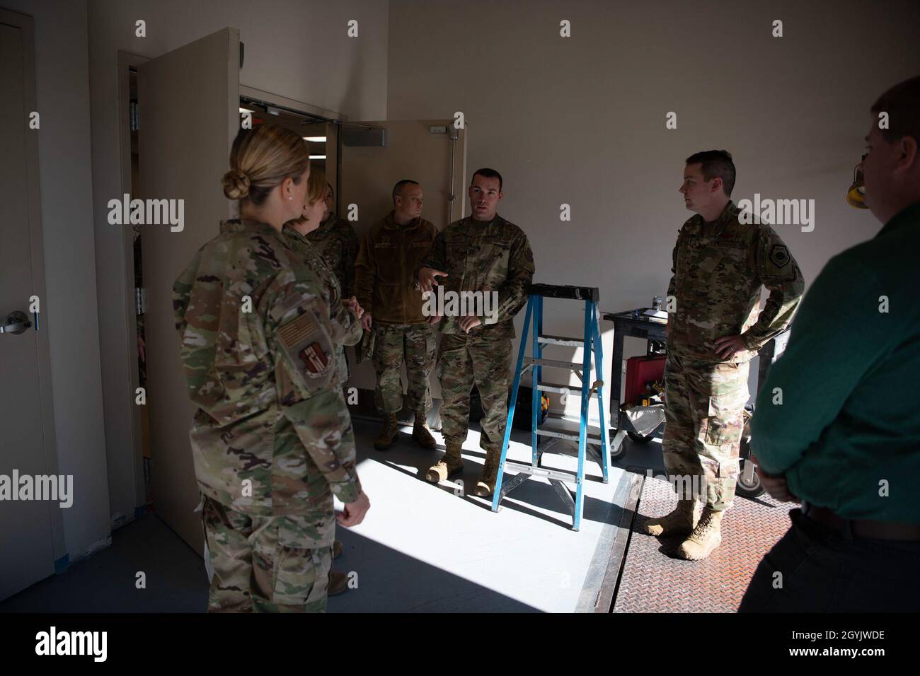 U.S. Air Force Capt. Michael Johnson, center, 60th Medical Group chief of Base Exchange Pharmacy ...