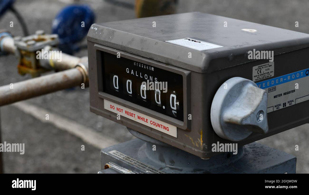 A fuel meter sits alongside an aircraft refueling station during ...