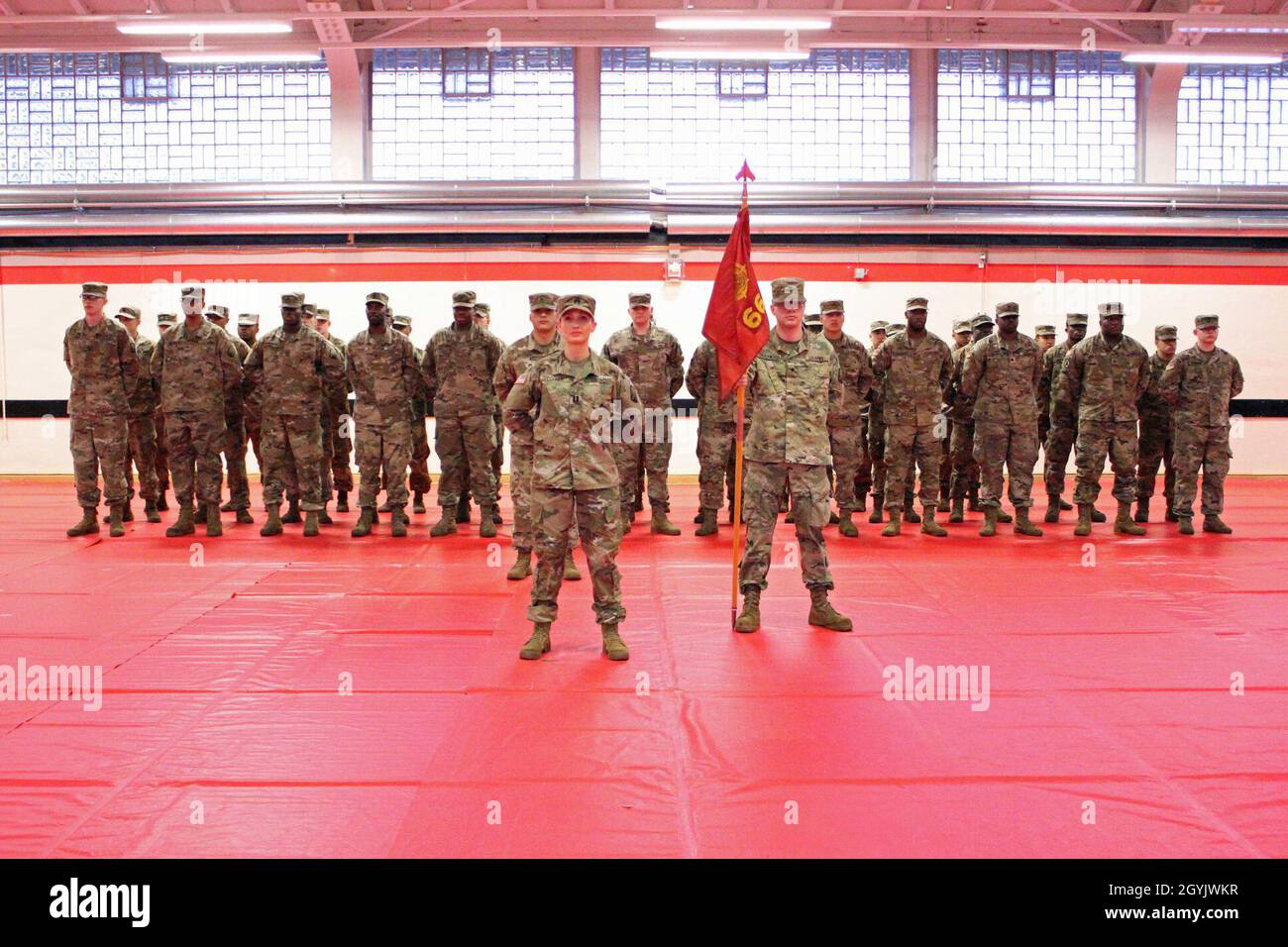 Soldiers from Task Force 66 stand in formation during a deployment ...