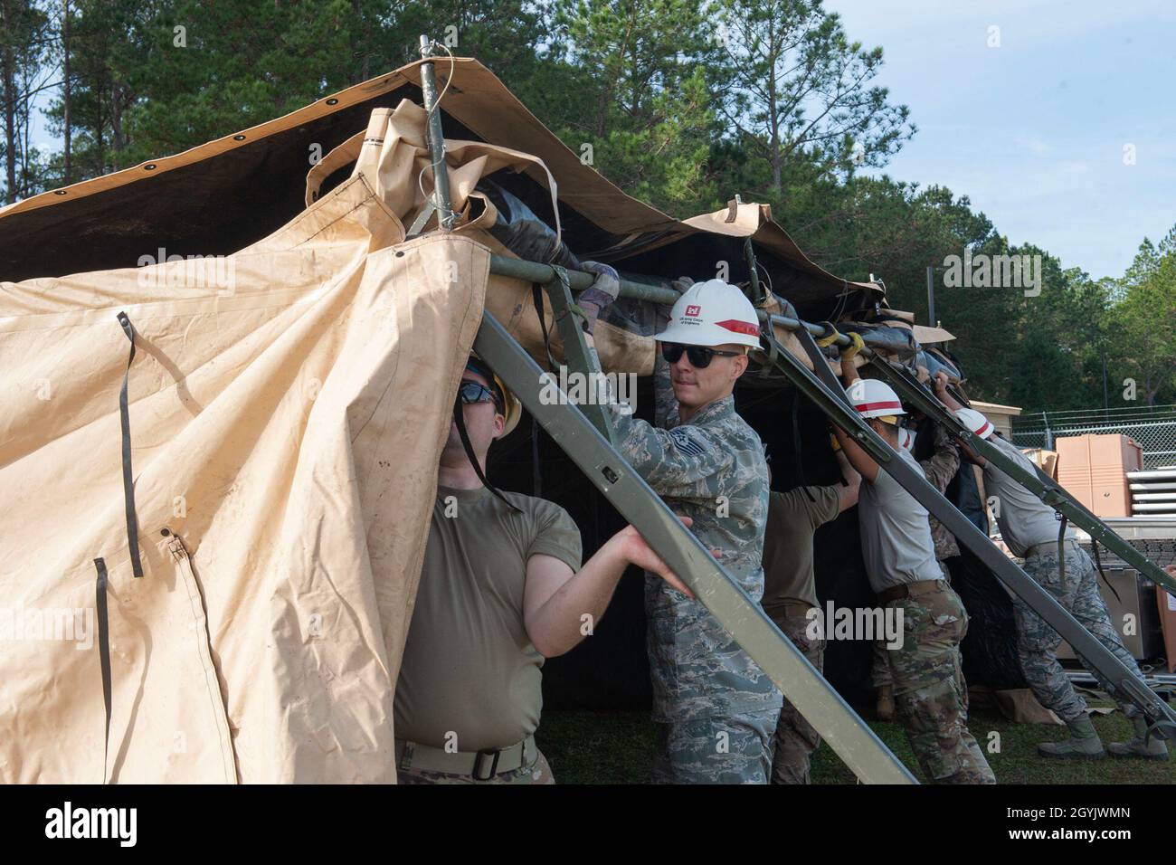 Airmen assigned to the 23d Force Support Squadron put up a tent during ...