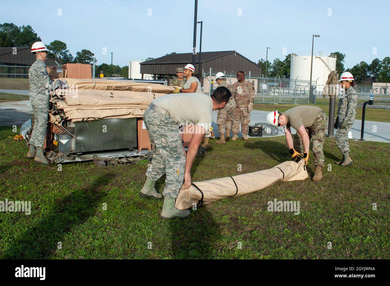 Airmen assigned to the 23d Force Support Squadron prepare to assemble a ...