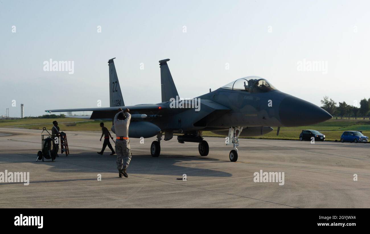 Airmen of the 18th Aircraft Maintenance Squadron arm a 44th Fighter ...