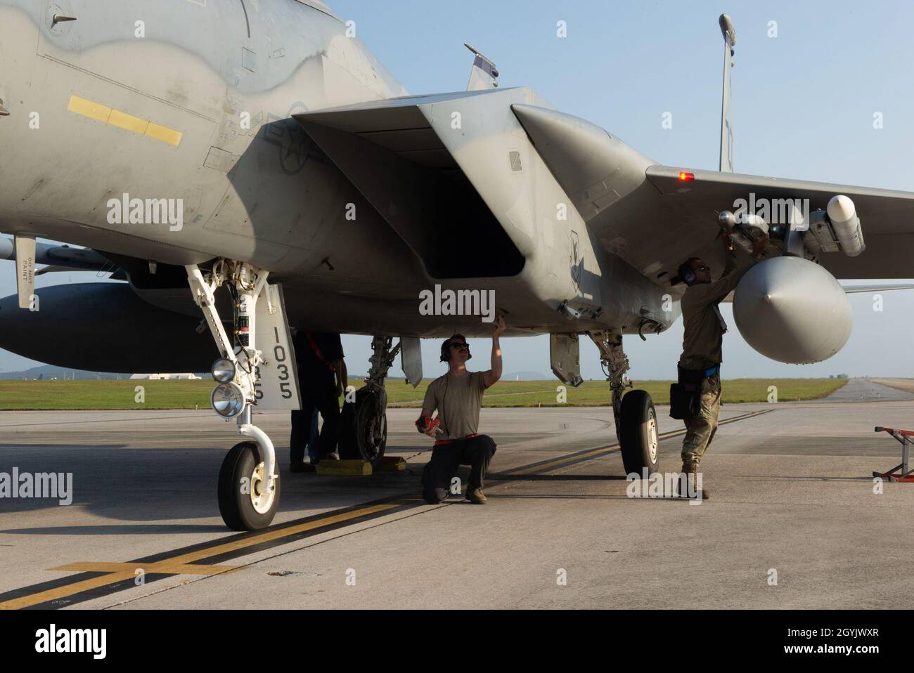 Airmen of the 18th Aircraft Maintenance Squadron arm a 44th Fighter ...