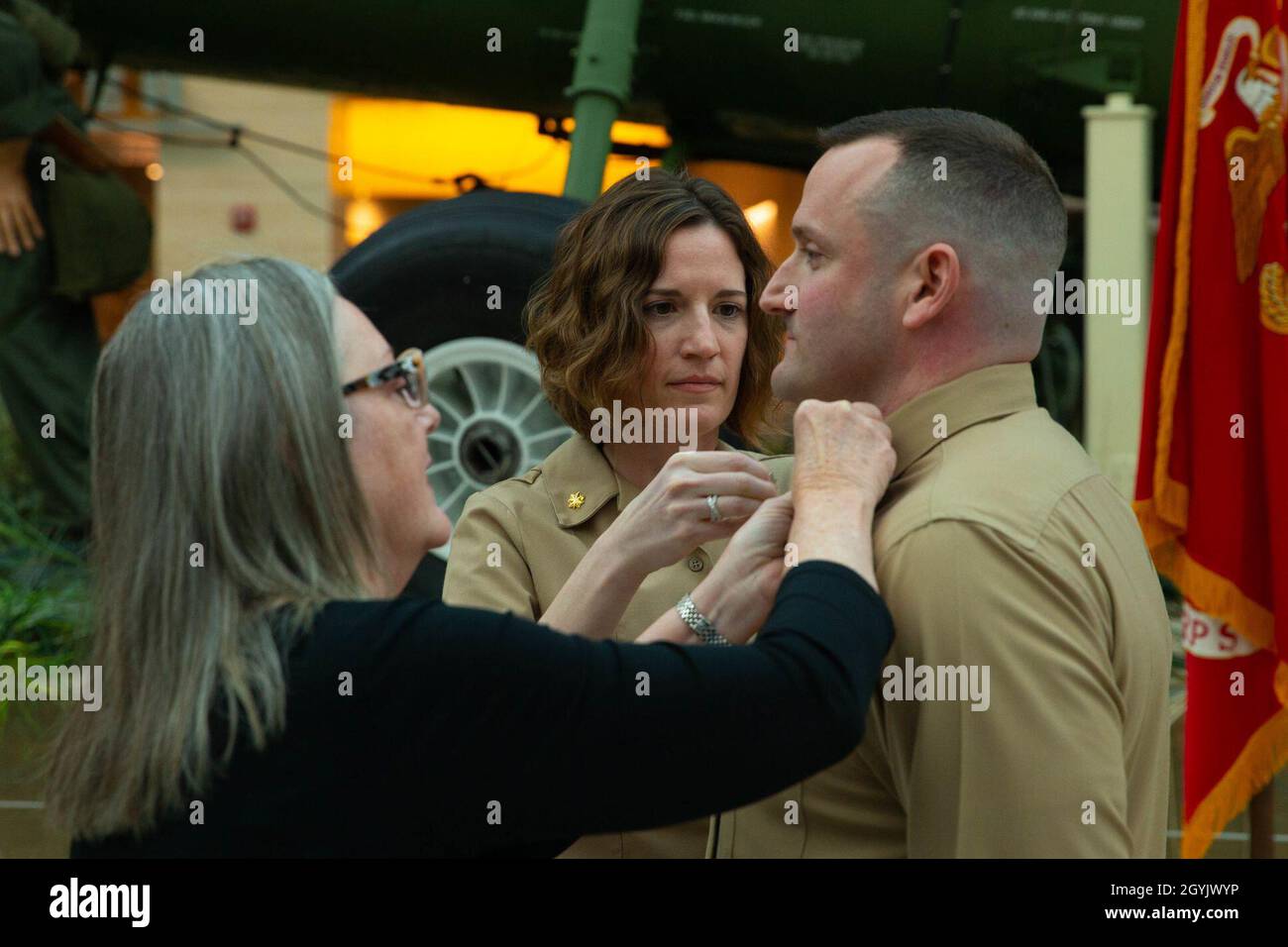 Lt. Cmder. Wendy Cacioppo, and her mother-in-law Judy, pin on ...