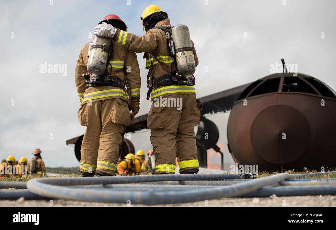 Firefighters from the Pacific Region participate in a live fire ...