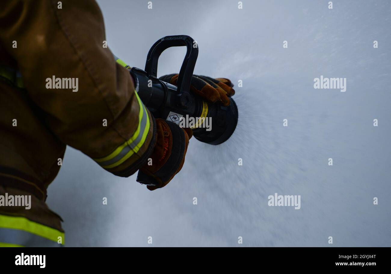 A firefighter assigned to the 36th Civil Engineer Squadron, Andersen ...