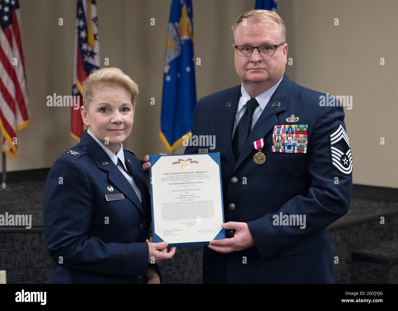 Col. Mary T. Gardner, commander 188th Mission Support Group, presents ...