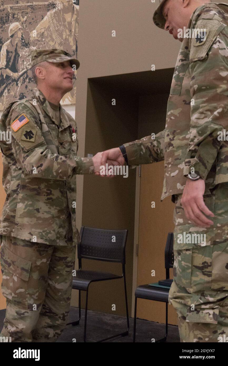 Col. Elmer Holt (left), outgoing commander of the 45th Field Artillery ...