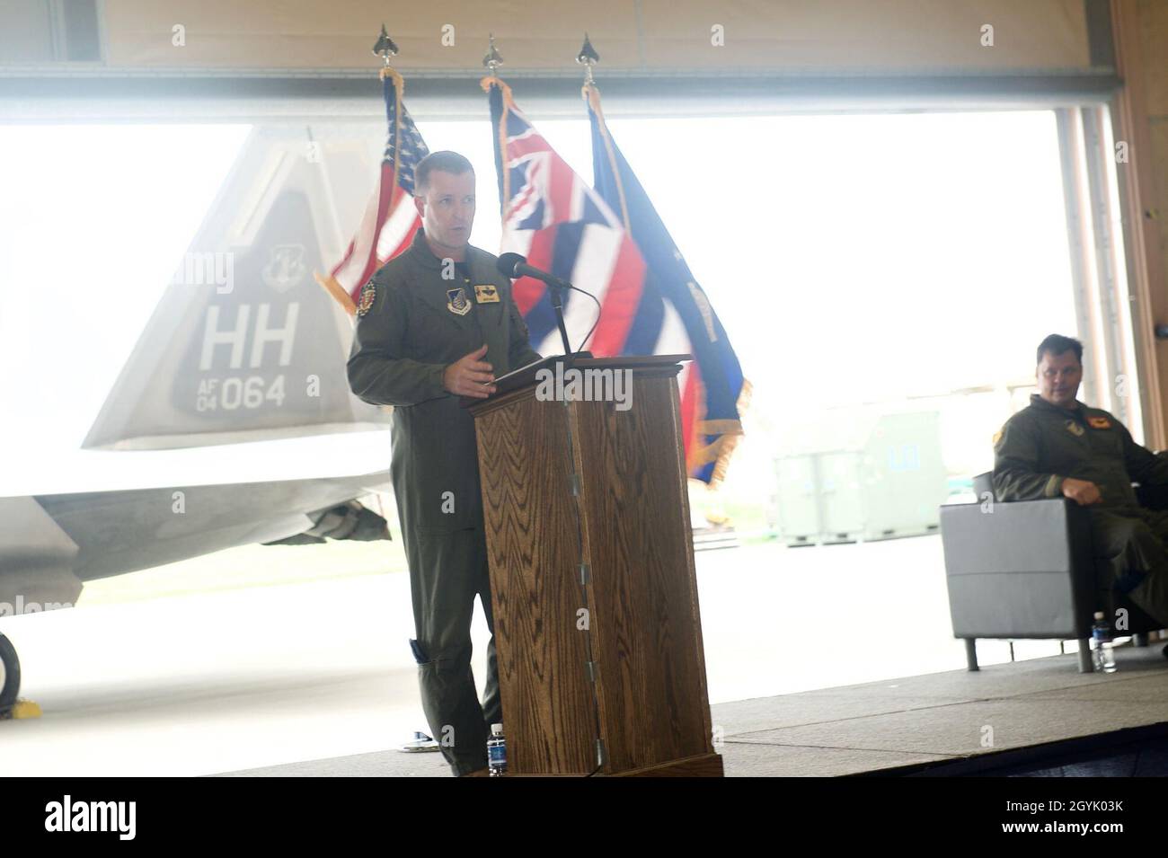 Lt. Col. Brian S. Nash, Commander, 199th Fighter Squadron, addresses a ...