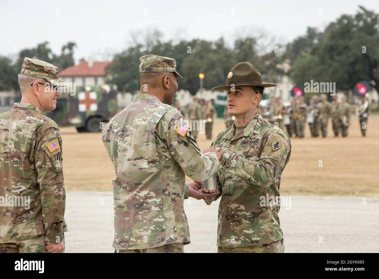 While LTG James E. Rainey looks on, Drill Sergeant David Nagel, the ...