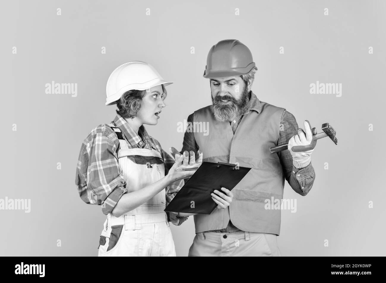 confident electrical and technician. engineers couple working together ...