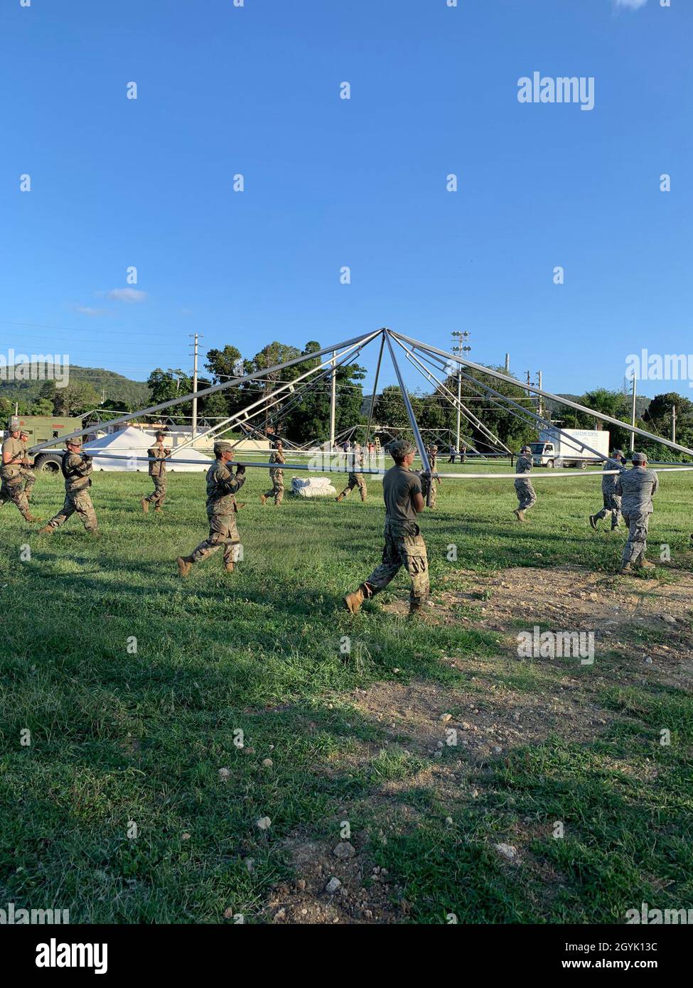 U.S. Airmen with the Puerto Rico Air National Guard provide support at ...
