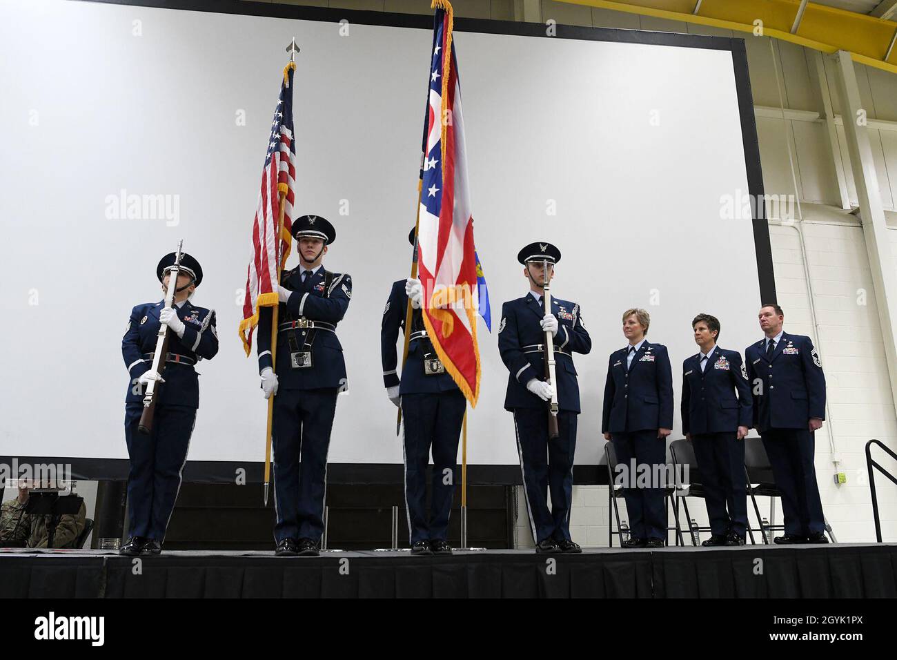 The color guard presents the colors during a change of authority ...