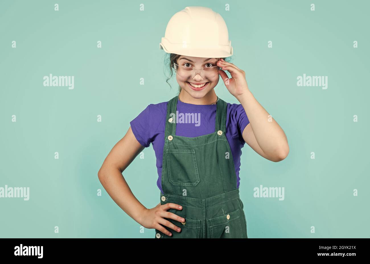 foreman teen child. kid work in helmet. little girl in a helmet. girl ...